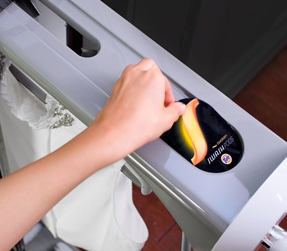 The Ultimate Combination Of A Washing Machine, Dryer and Iron